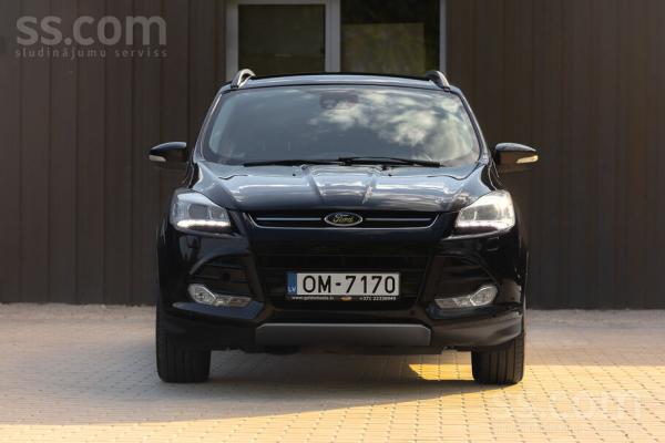 Black Ford Kuga 2013 in Jelgava, with an engine capacity of 2.00 L and mileage of 246 thousand km for 9900 €, photo 2 on AUTOMOTO.COM.LV