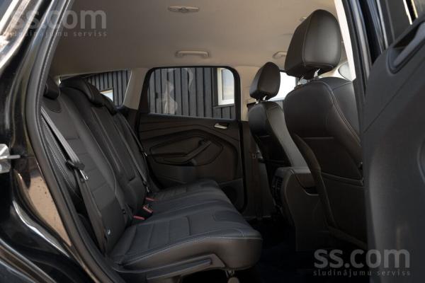 Black Ford Kuga 2013 in Jelgava, with an engine capacity of 2.00 L and mileage of 246 thousand km for 9900 €, photo 9 on AUTOMOTO.COM.LV