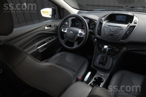 Black Ford Kuga 2013 in Jelgava, with an engine capacity of 2.00 L and mileage of 246 thousand km for 9900 €, photo 10 on AUTOMOTO.COM.LV