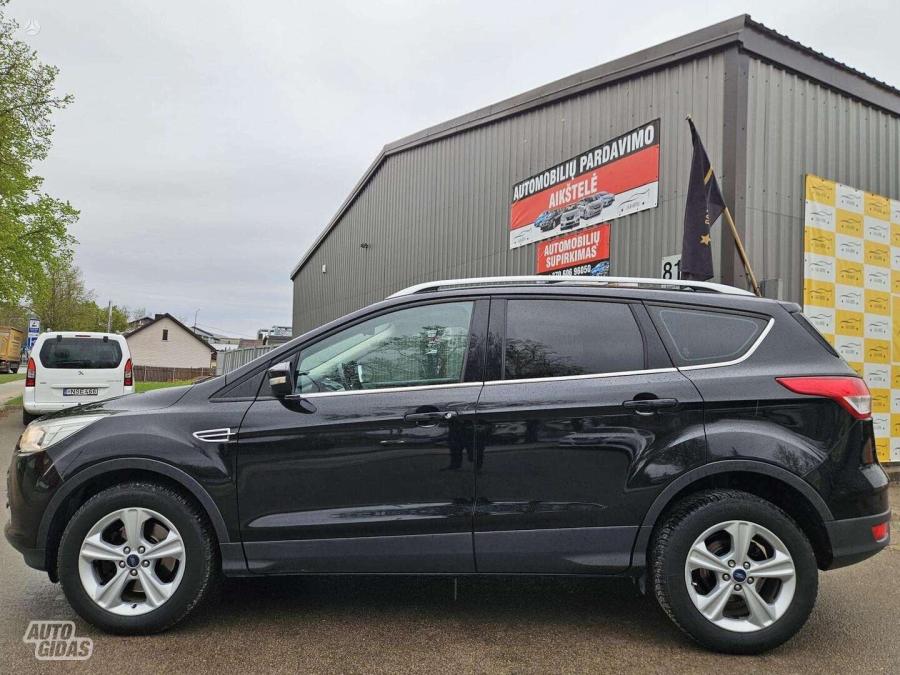 Black Ford Kuga 2013 in Siauliai, with an engine capacity of 2.00 L and mileage of 191 thousand km for 7950 €, photo 8 on AUTOMOTO.COM.LV