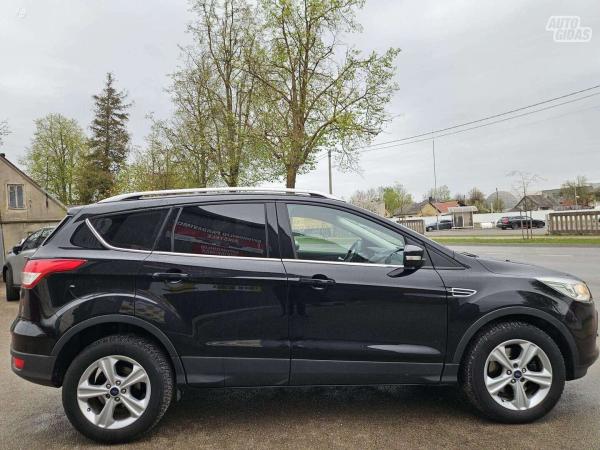 Black Ford Kuga 2013 in Siauliai, with an engine capacity of 2.00 L and mileage of 191 thousand km for 7950 €, photo 10 on AUTOMOTO.COM.LV