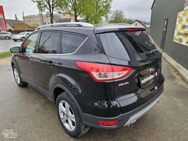 Black Ford Kuga 2013 in Siauliai, with an engine capacity of 2.00 L and mileage of 191 thousand km for 7950 €, photo 5 on AUTOMOTO.COM.LV