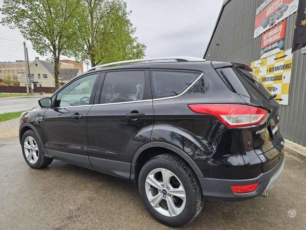 Black Ford Kuga 2013 in Siauliai, with an engine capacity of 2.00 L and mileage of 191 thousand km for 7950 €, photo 9 on AUTOMOTO.COM.LV