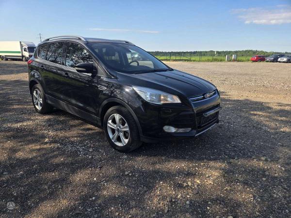 Black Ford Kuga 2013 in Kaunas, with an engine capacity of 2.00 L and mileage of 230 thousand km for 3900 €, photo 1 on AUTOMOTO.COM.LV