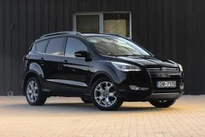 Black Ford Kuga 2013 in Jelgava, with an engine capacity of 2.00 L and mileage of 246 thousand km for 9600 €, photo  on AUTOMOTO.COM.LV