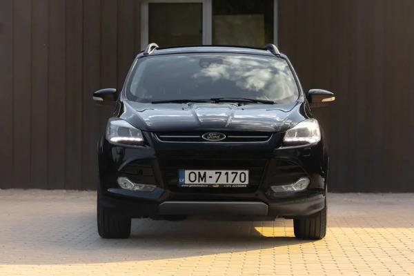 Black Ford Kuga 2013 in Jelgava, with an engine capacity of 2.00 L and mileage of 246 thousand km for 9600 €, photo 2 on AUTOMOTO.COM.LV