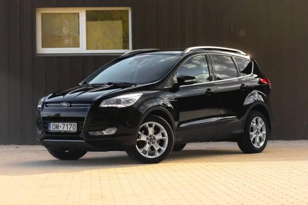 Black Ford Kuga 2013 in Jelgava, with an engine capacity of 2.00 L and mileage of 246 thousand km for 9600 €, photo 3 on AUTOMOTO.COM.LV