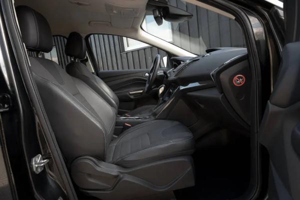 Black Ford Kuga 2013 in Jelgava, with an engine capacity of 2.00 L and mileage of 246 thousand km for 9600 €, photo 7 on AUTOMOTO.COM.LV