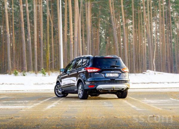 Black Ford Kuga 2013 in Riga, with an engine capacity of 2.00 L and mileage of 213 thousand km for 5990 €, photo 7 on AUTOMOTO.COM.LV