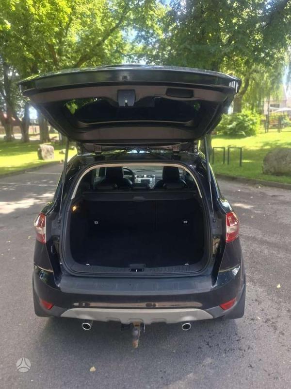 Black Ford Kuga 2013 in Kursenai, with an engine capacity of 2.00 L and mileage of 322 thousand km for 4500 €, photo 6 on AUTOMOTO.COM.LV