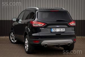 Black Ford Kuga 2013 in Talsi, with an engine capacity of 2.00 L and mileage of 222 thousand km for 7650 €, photo 5 on AUTOMOTO.COM.LV