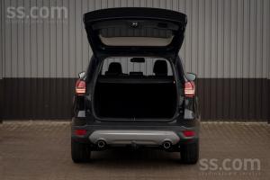 Black Ford Kuga 2013 in Talsi, with an engine capacity of 2.00 L and mileage of 222 thousand km for 7650 €, photo 7 on AUTOMOTO.COM.LV
