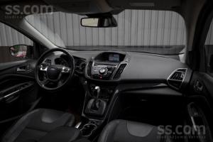 Black Ford Kuga 2013 in Talsi, with an engine capacity of 2.00 L and mileage of 222 thousand km for 7650 €, photo 9 on AUTOMOTO.COM.LV