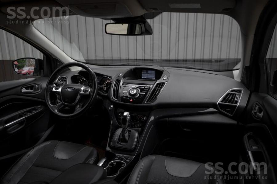 Black Ford Kuga 2013 in Talsi, with an engine capacity of 2.00 L and mileage of 222 thousand km for 7650 €, photo 9 on AUTOMOTO.COM.LV