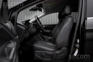 Black Ford Kuga 2013 in Talsi, with an engine capacity of 2.00 L and mileage of 222 thousand km for 7650 €, photo 10 on AUTOMOTO.COM.LV