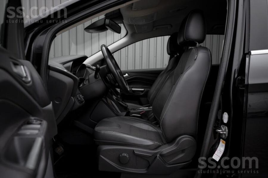 Black Ford Kuga 2013 in Talsi, with an engine capacity of 2.00 L and mileage of 222 thousand km for 7650 €, photo 10 on AUTOMOTO.COM.LV
