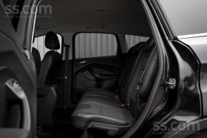 Black Ford Kuga 2013 in Talsi, with an engine capacity of 2.00 L and mileage of 222 thousand km for 7650 €, photo 11 on AUTOMOTO.COM.LV