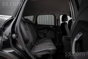 Black Ford Kuga 2013 in Talsi, with an engine capacity of 2.00 L and mileage of 222 thousand km for 7650 €, photo 12 on AUTOMOTO.COM.LV