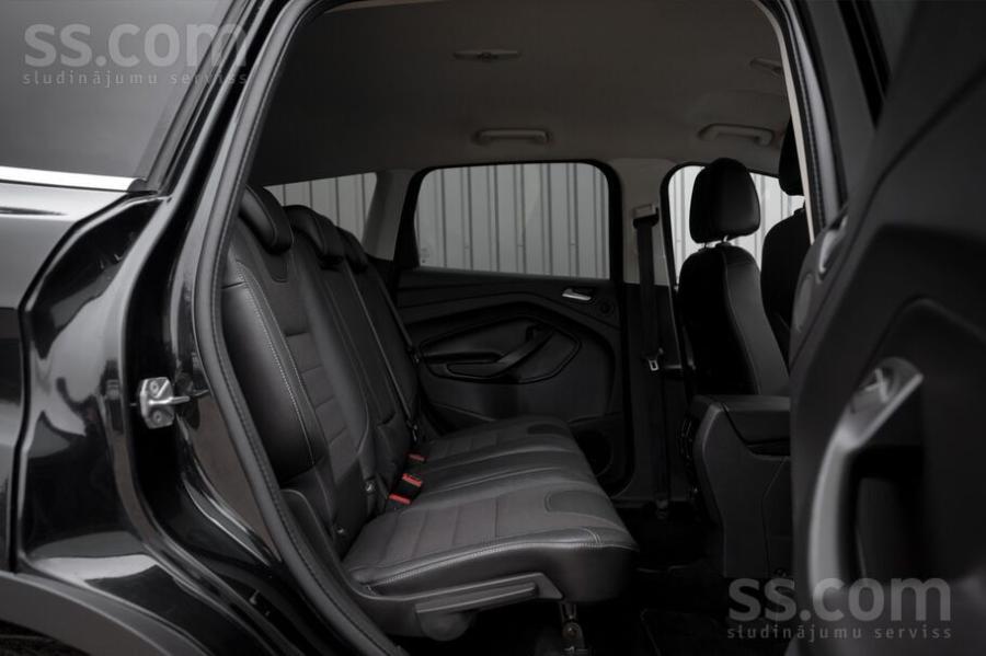 Black Ford Kuga 2013 in Talsi, with an engine capacity of 2.00 L and mileage of 222 thousand km for 7650 €, photo 12 on AUTOMOTO.COM.LV