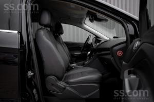 Black Ford Kuga 2013 in Talsi, with an engine capacity of 2.00 L and mileage of 222 thousand km for 7650 €, photo 13 on AUTOMOTO.COM.LV