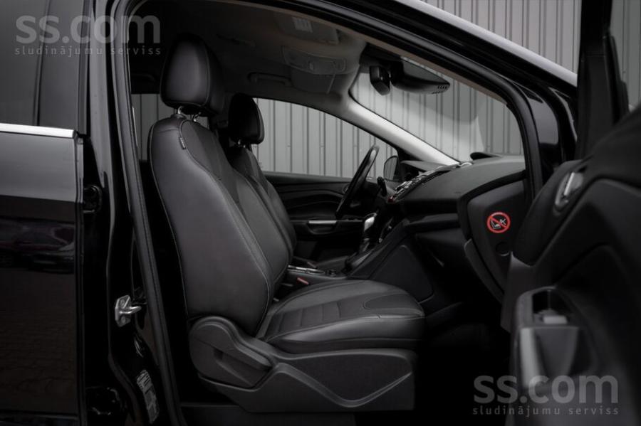 Black Ford Kuga 2013 in Talsi, with an engine capacity of 2.00 L and mileage of 222 thousand km for 7650 €, photo 13 on AUTOMOTO.COM.LV