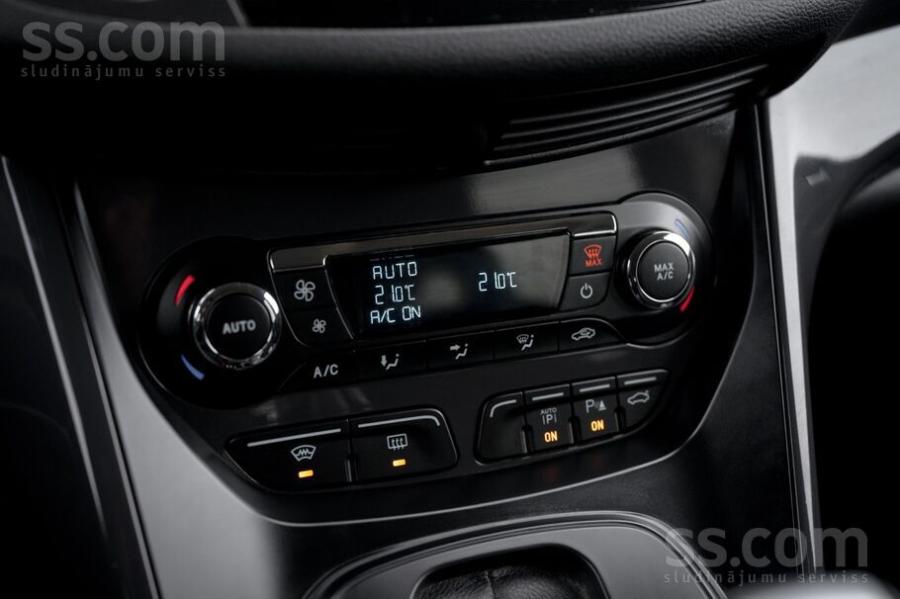 Black Ford Kuga 2013 in Talsi, with an engine capacity of 2.00 L and mileage of 222 thousand km for 7650 €, photo 25 on AUTOMOTO.COM.LV