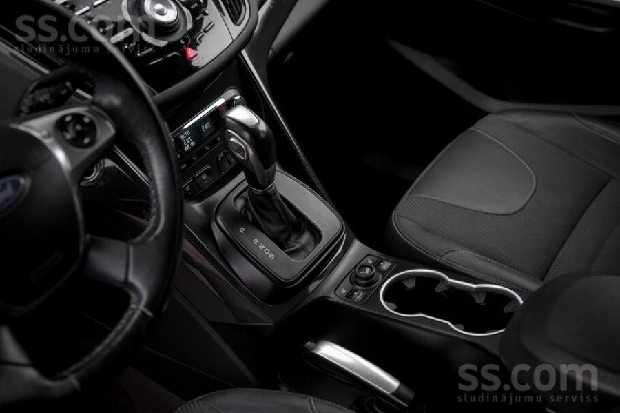 Black Ford Kuga 2013 in Talsi, with an engine capacity of 2.00 L and mileage of 222 thousand km for 7650 €, photo 27 on AUTOMOTO.COM.LV