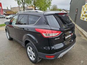 Black Ford Kuga 2013 in Siauliai, with an engine capacity of 2.00 L and mileage of 191 thousand km for 7750 €, photo 9 on AUTOMOTO.COM.LV