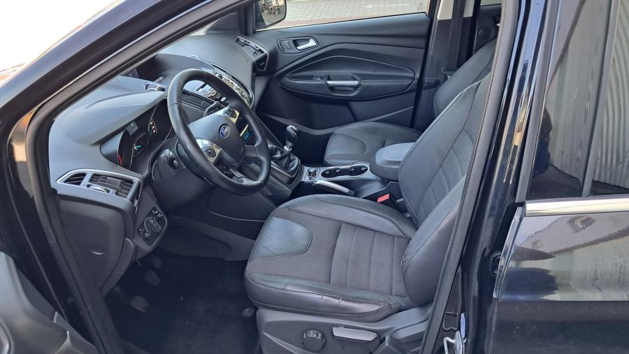 Black Ford Kuga 2013 in Klaipeda, with an engine capacity of 2.00 L and mileage of 277 thousand km for 6920 €, photo 19 on AUTOMOTO.COM.LV
