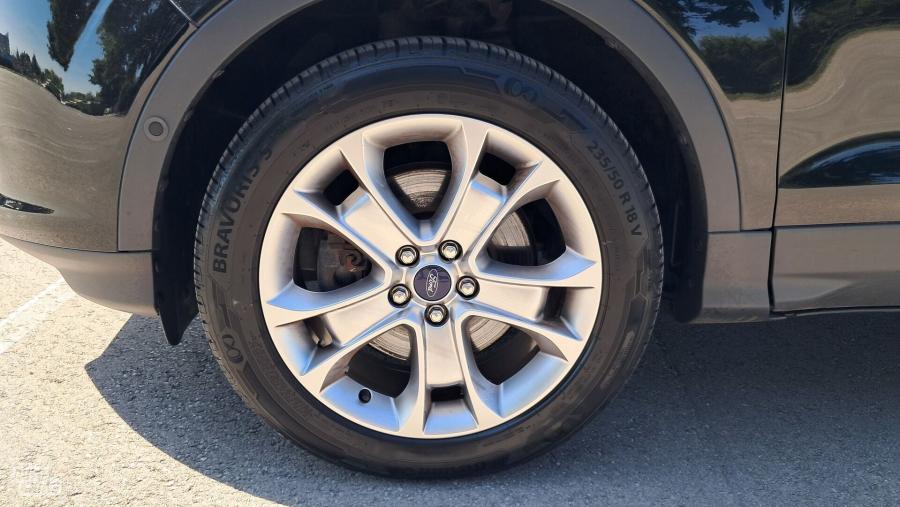 Black Ford Kuga 2013 in Klaipeda, with an engine capacity of 2.00 L and mileage of 277 thousand km for 6920 €, photo 24 on AUTOMOTO.COM.LV