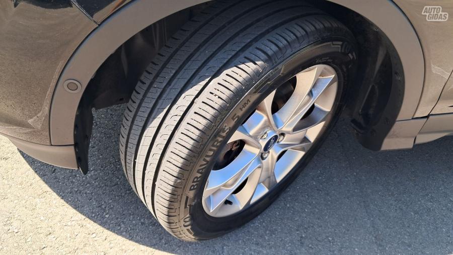 Black Ford Kuga 2013 in Klaipeda, with an engine capacity of 2.00 L and mileage of 277 thousand km for 6920 €, photo 25 on AUTOMOTO.COM.LV