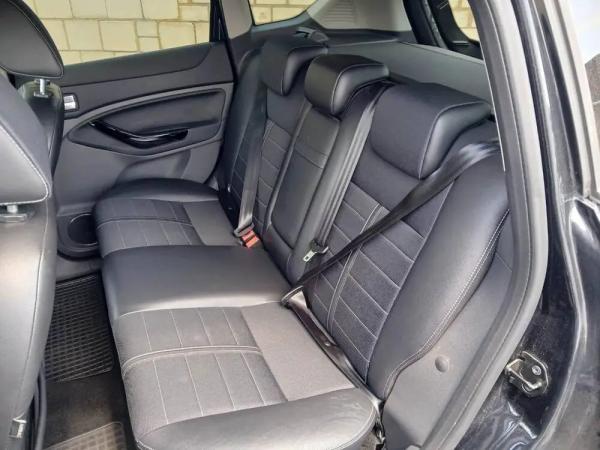 Black Ford Kuga 2013 in Limbazi, with an engine capacity of 2.00 L and mileage of 242 thousand km for 6150 €, photo 10 on AUTOMOTO.COM.LV