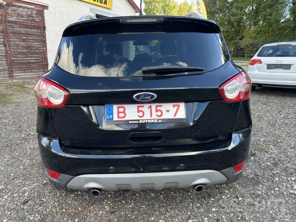 Black Ford Kuga 2013 in Limbazi, with an engine capacity of 2.00 L and mileage of 242 thousand km for 6150 €, photo 6 on AUTOMOTO.COM.LV