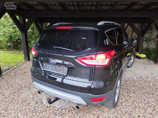 Ford Kuga 2013 in Utena on AUTOMOTO.COM.LV Black Ford Kuga 2013 in Utena, with an engine capacity of 2.00 L and mileage of 220 thousand km for 6990 €, photo 3 on AUTOMOTO.COM.LV