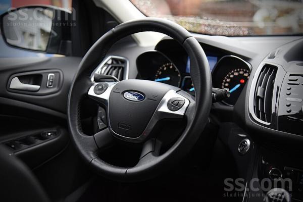Black Ford Kuga 2014 in Tukums, with an engine capacity of 1.60 L and mileage of 122 thousand km for 9990 €, photo 9 on AUTOMOTO.COM.LV