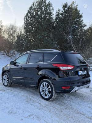 Black Ford Kuga 2014 in Utena, with an engine capacity of 2.00 L and mileage of 194 thousand km for 12350 €, photo  on AUTOMOTO.COM.LV