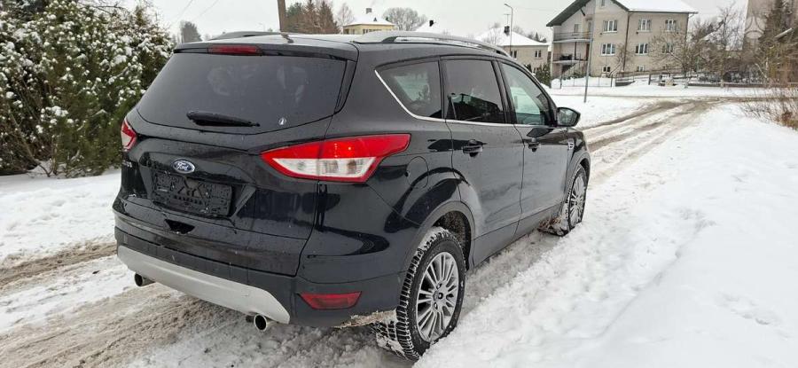 Black Ford Kuga 2014 in Kaunas, with an engine capacity of 2.00 L and mileage of 173 thousand km for 8700 €, photo 6 on AUTOMOTO.COM.LV