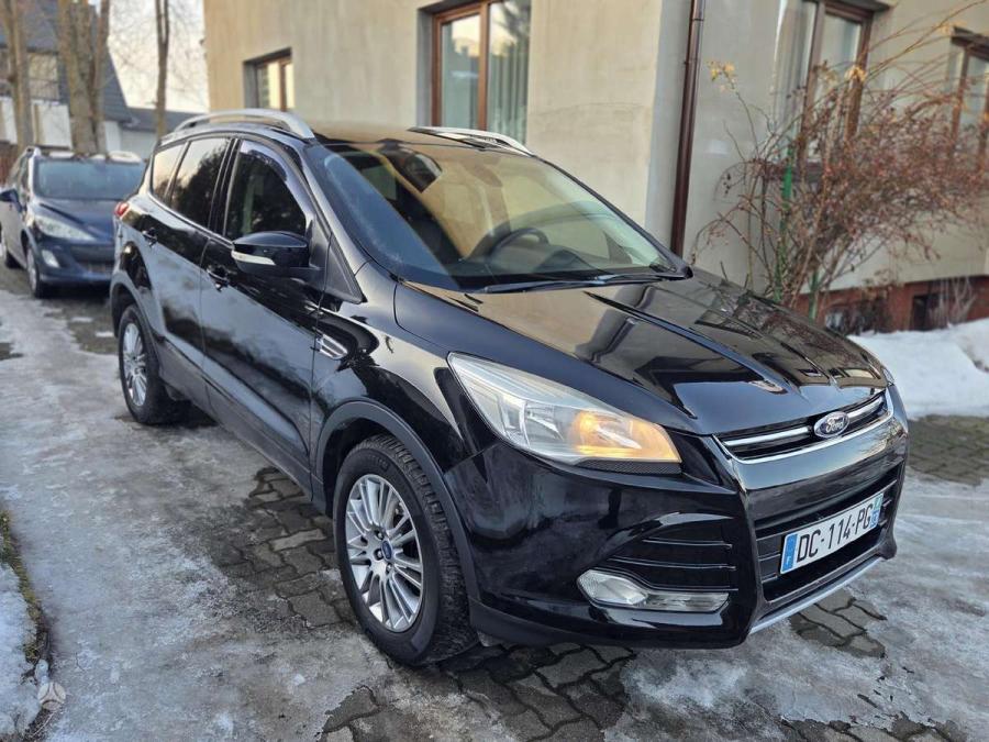 Black Ford Kuga 2014 in Taurage, with an engine capacity of 2.00 L and mileage of 135 thousand km for 7700 €, photo 1 on AUTOMOTO.COM.LV