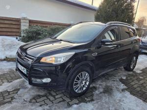 Black Ford Kuga 2014 in Taurage, with an engine capacity of 2.00 L and mileage of 135 thousand km for 7700 €, photo 2 on AUTOMOTO.COM.LV