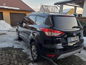 Black Ford Kuga 2014 in Taurage, with an engine capacity of 2.00 L and mileage of 135 thousand km for 7700 €, photo 4 on AUTOMOTO.COM.LV