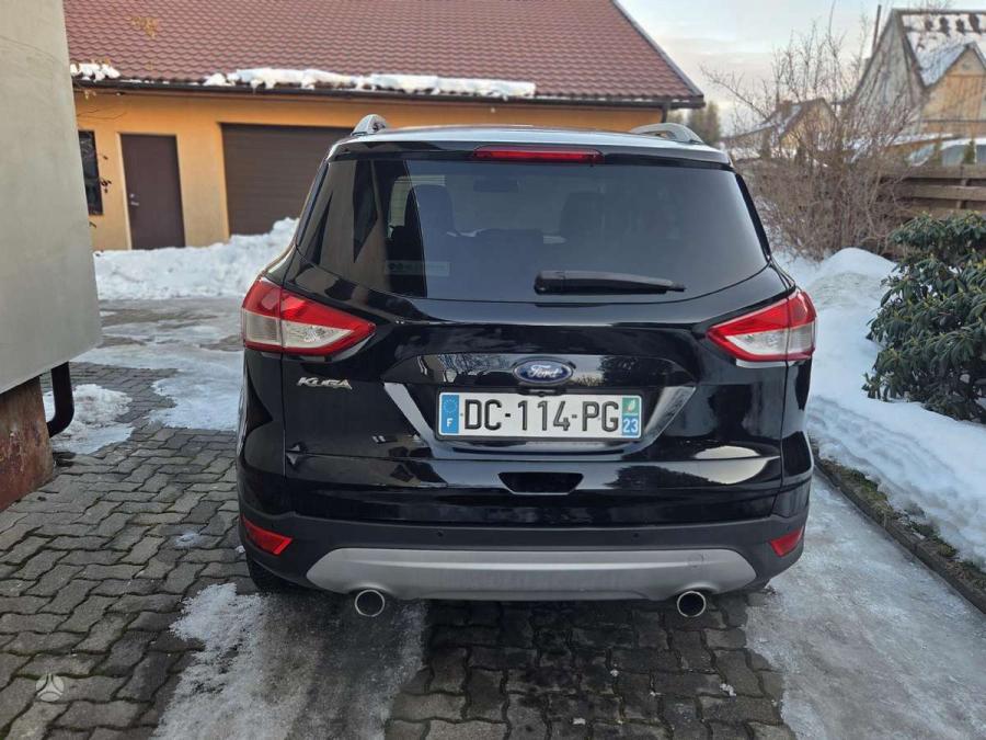 Black Ford Kuga 2014 in Taurage, with an engine capacity of 2.00 L and mileage of 135 thousand km for 7700 €, photo 5 on AUTOMOTO.COM.LV