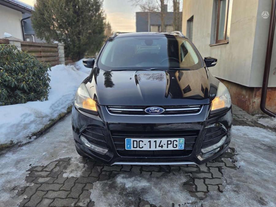Black Ford Kuga 2014 in Taurage, with an engine capacity of 2.00 L and mileage of 135 thousand km for 7700 €, photo 6 on AUTOMOTO.COM.LV