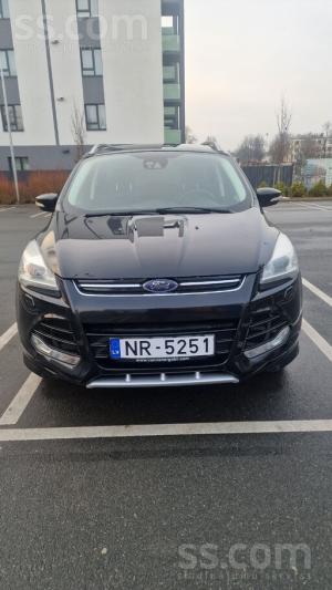 Black Ford Kuga 2014 in Riga, with an engine capacity of 2.00 L and mileage of 213 thousand km for 8500 €, photo  on AUTOMOTO.COM.LV
