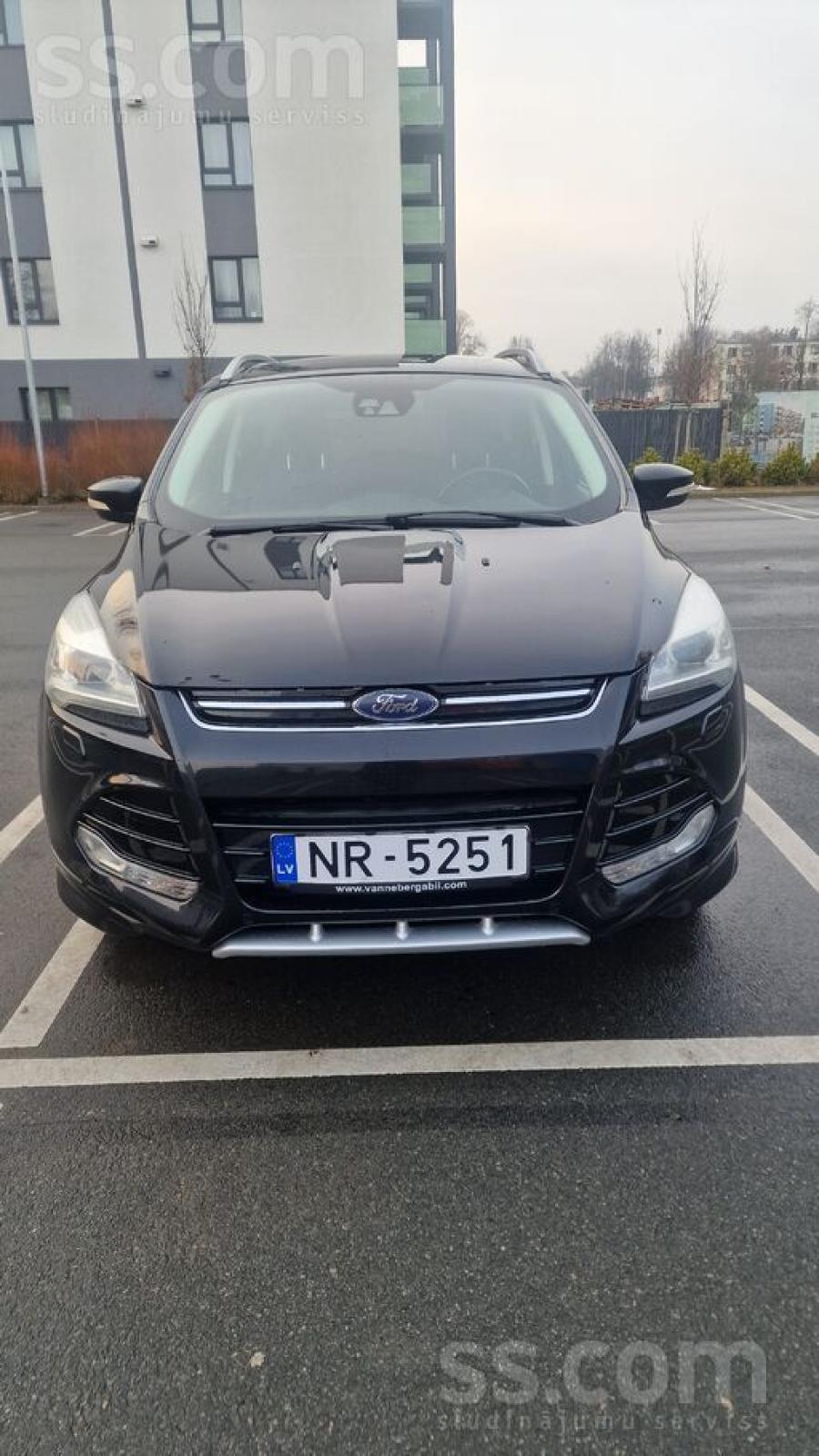 Black Ford Kuga 2014 in Riga, with an engine capacity of 2.00 L and mileage of 213 thousand km for 8500 €, photo 1 on AUTOMOTO.COM.LV