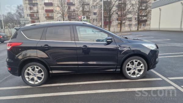 Black Ford Kuga 2014 in Riga, with an engine capacity of 2.00 L and mileage of 213 thousand km for 7500 €, photo 2 on AUTOMOTO.COM.LV