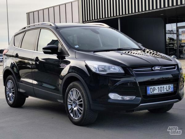 Black Ford Kuga 2014 in Siauliai, with an engine capacity of 2.00 L and mileage of 214 thousand km for 7700 €, photo 1 on AUTOMOTO.COM.LV
