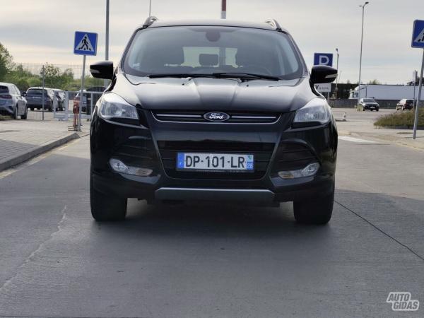 Black Ford Kuga 2014 in Siauliai, with an engine capacity of 2.00 L and mileage of 214 thousand km for 7700 €, photo 3 on AUTOMOTO.COM.LV