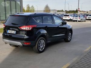 Black Ford Kuga 2014 in Siauliai, with an engine capacity of 2.00 L and mileage of 214 thousand km for 7700 €, photo 5 on AUTOMOTO.COM.LV