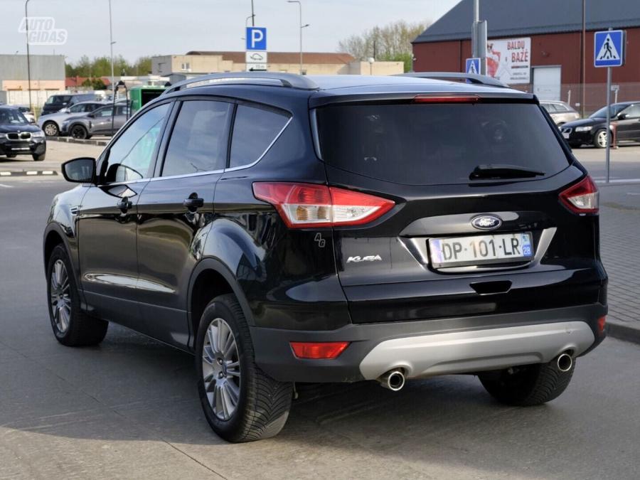 Black Ford Kuga 2014 in Siauliai, with an engine capacity of 2.00 L and mileage of 214 thousand km for 7700 €, photo 6 on AUTOMOTO.COM.LV