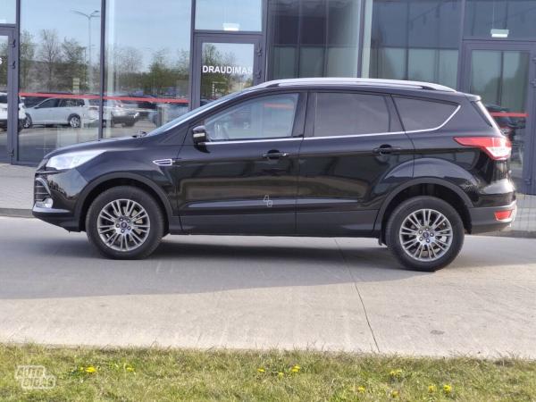 Black Ford Kuga 2014 in Siauliai, with an engine capacity of 2.00 L and mileage of 214 thousand km for 7700 €, photo 7 on AUTOMOTO.COM.LV